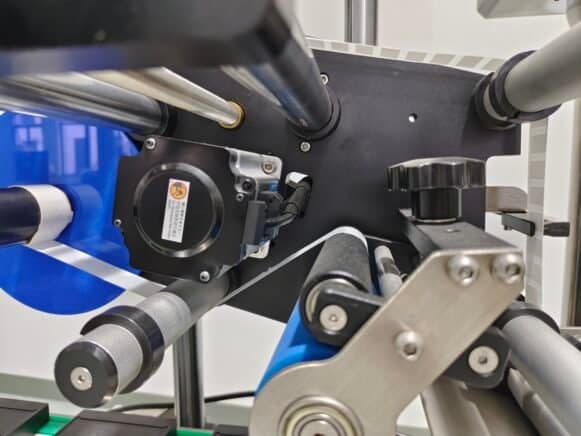 Labeling Machines & Label Applicators | Grand