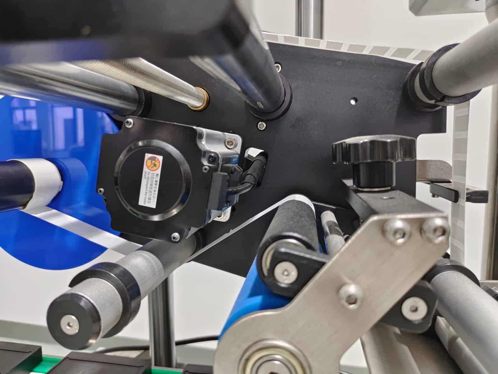 Labeling Machines & Label Applicators | Grand